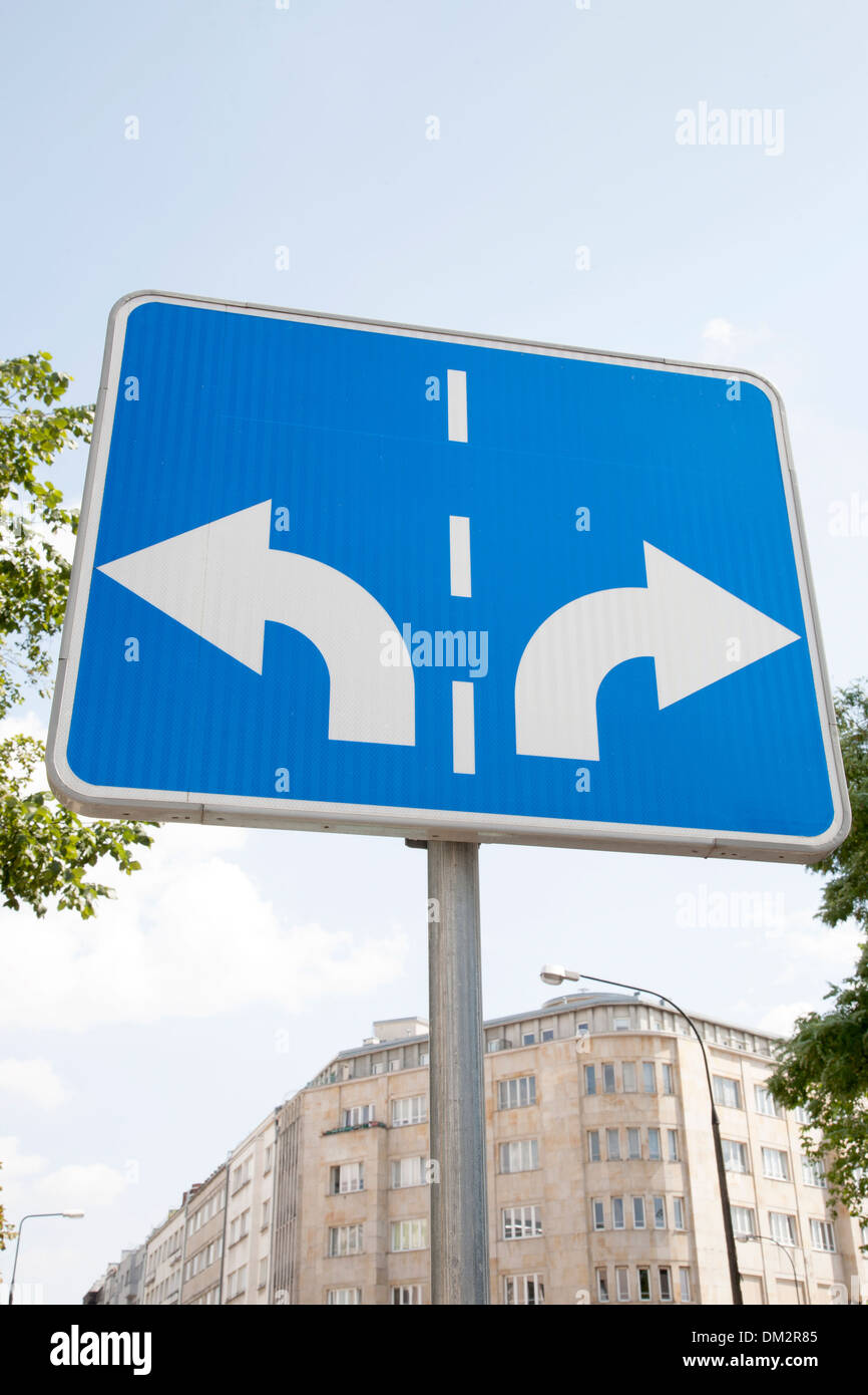 Traffic sign two arrows pointing hi-res stock photography and images ...