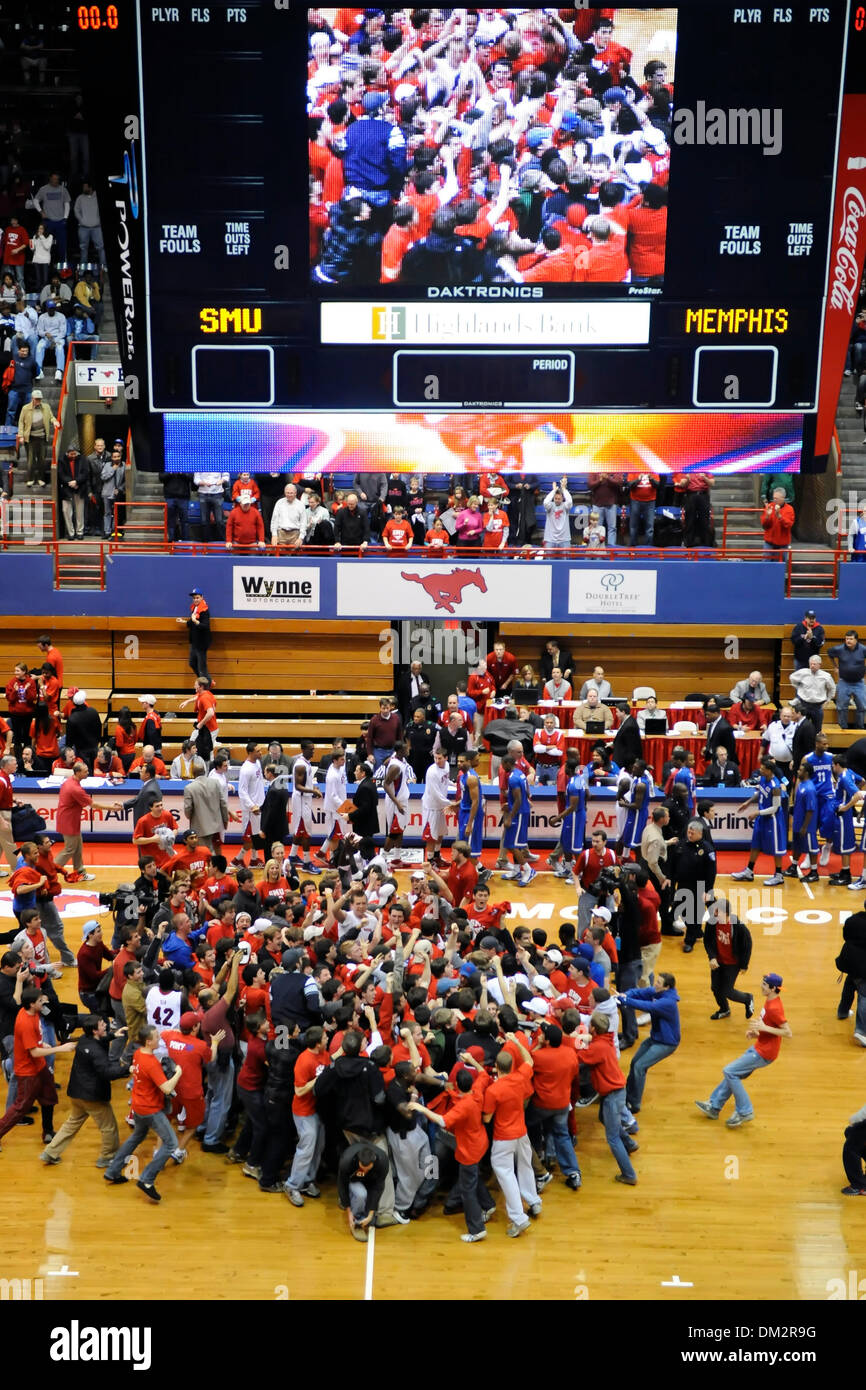 SMU fans rush the court after defeating the Memphis Tigers at Moody ...