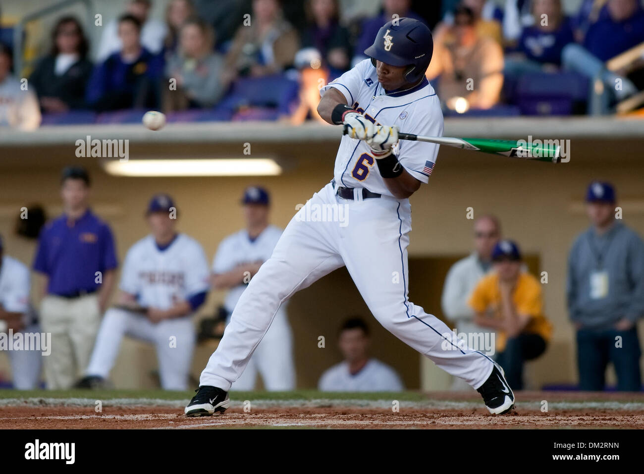 Centenary at LSU; LSU outfielder Leon Landry (6) connects with a pitch ...