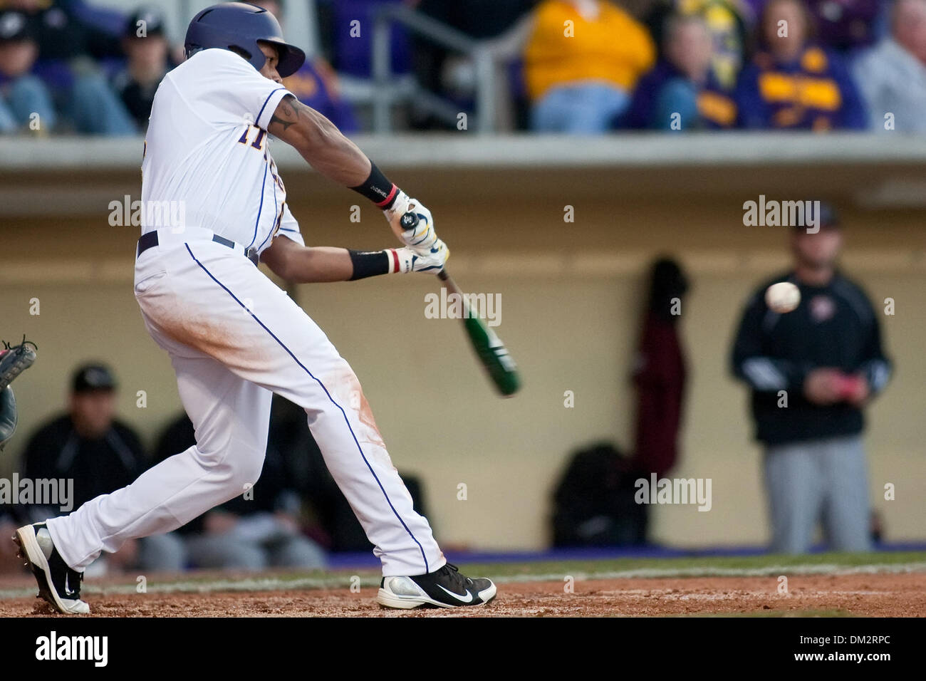 Centenary at LSU; LSU outfielder Leon Landry (6) connects with a pitch ...