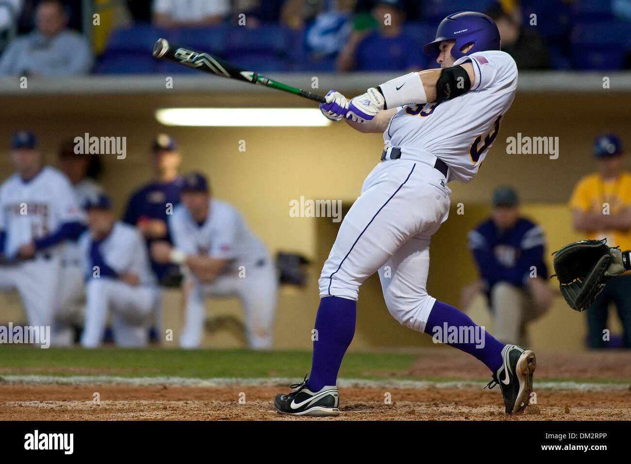 Centenary at LSU; LSU catcher Micah Gibbs (33) connects with a pitch ...