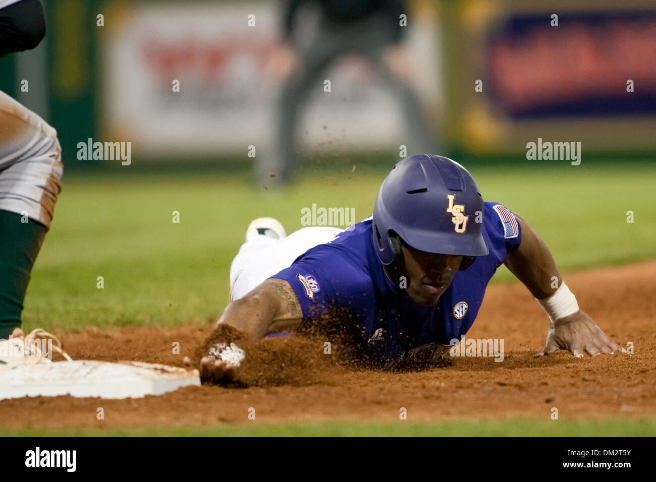 William & Mary at LSU; LSU outfielder Trey Watkins (3) dives to first ...
