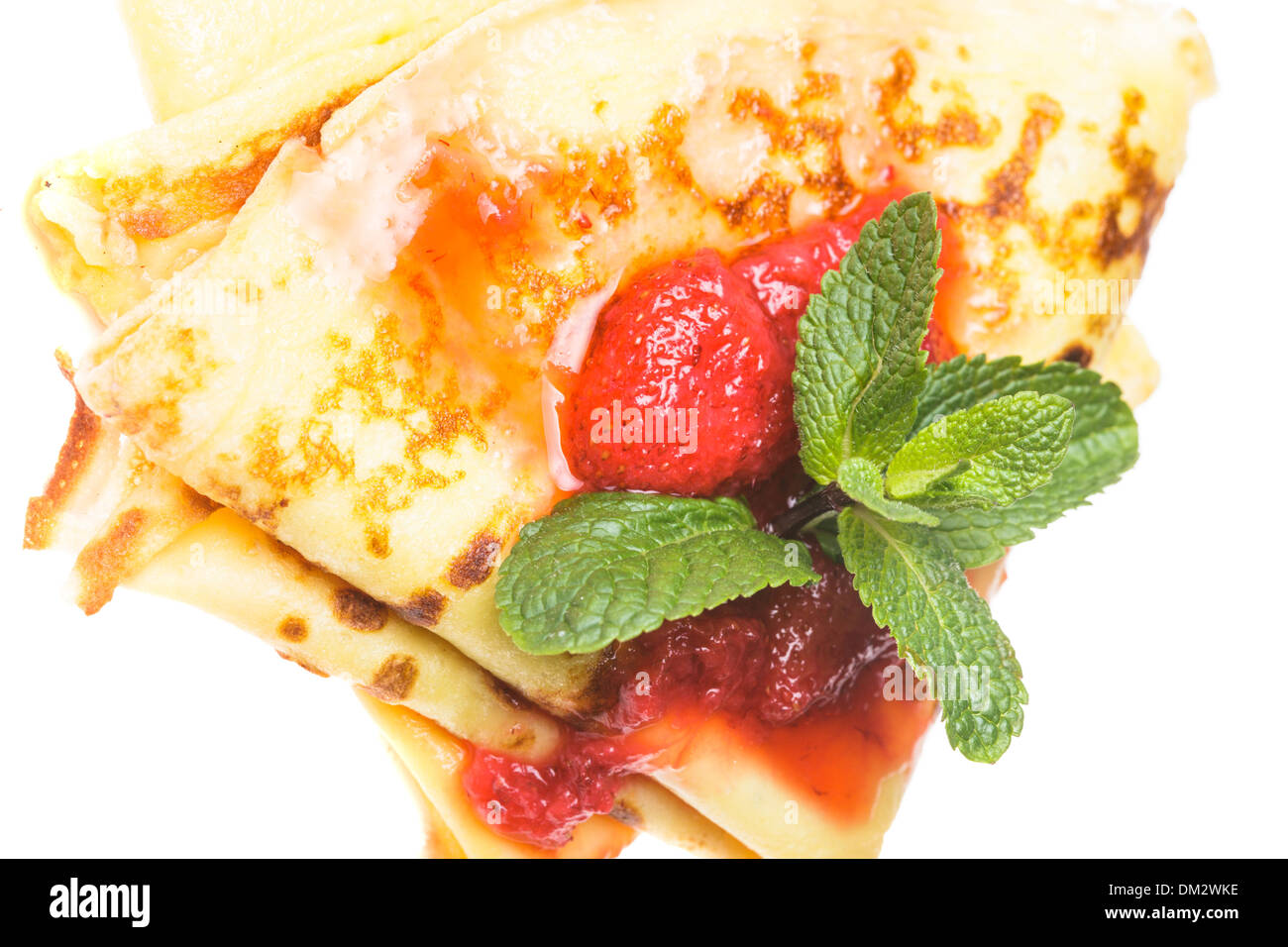 Crepes with strawberry jam and mint isolated on white background Stock ...