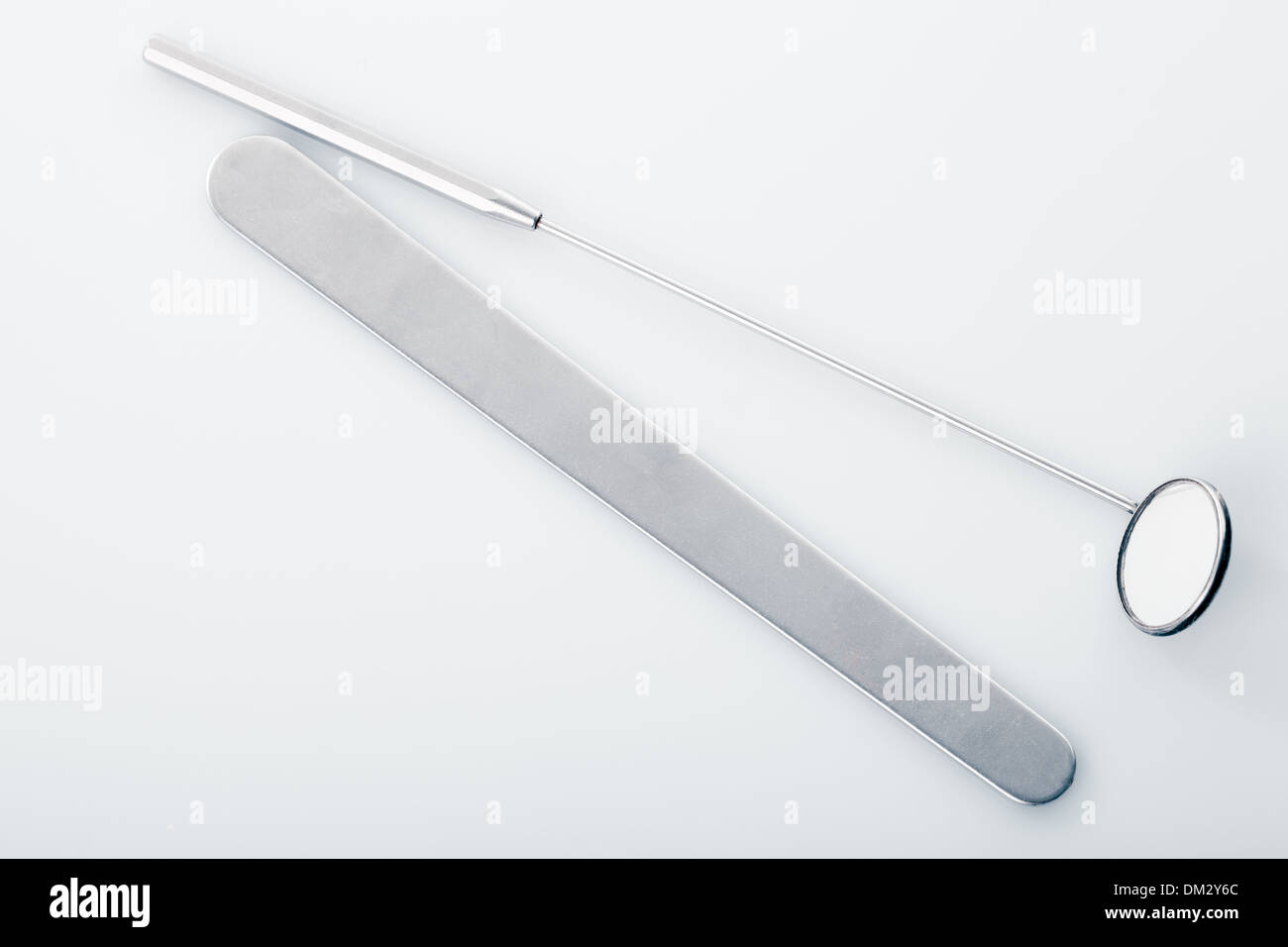 Medical instruments for ENT doctor: mirror and scapula for throat ...