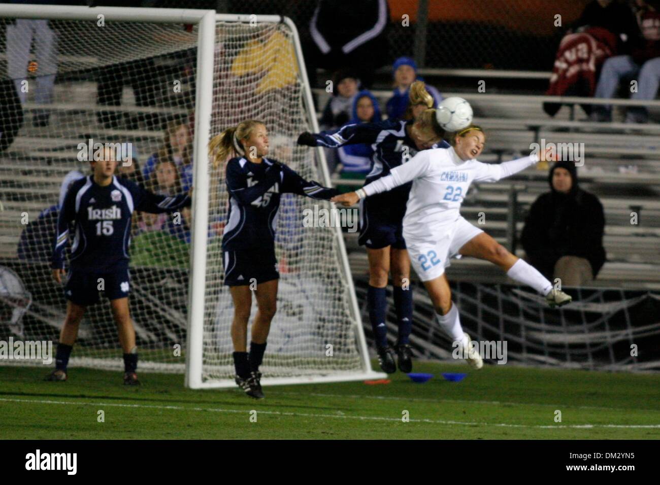 North Carolina Defender Amber Brooks (22) heads a corner kick in front ...