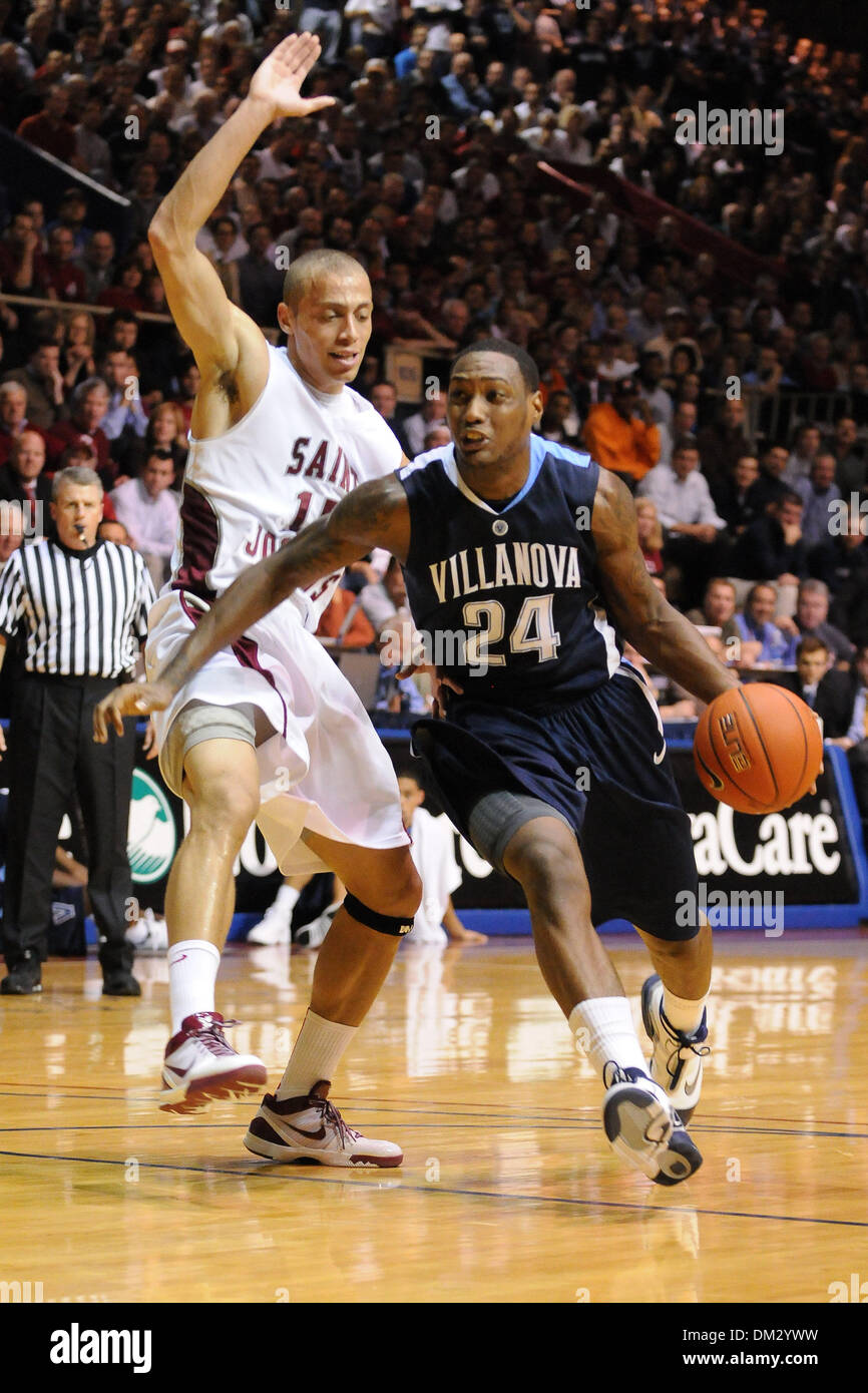 Villanova Guard Corey Stokes #24 is gaurded by St. Josephs Guard ...