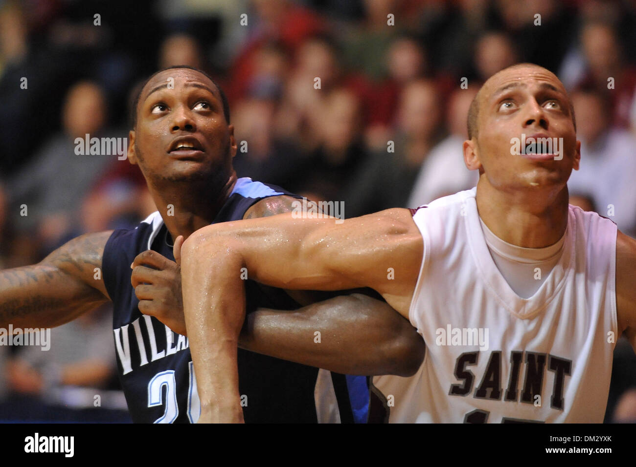 Villanova Guard Corey Stokes #24 and St. Josephs Guard Darrin Govens ...