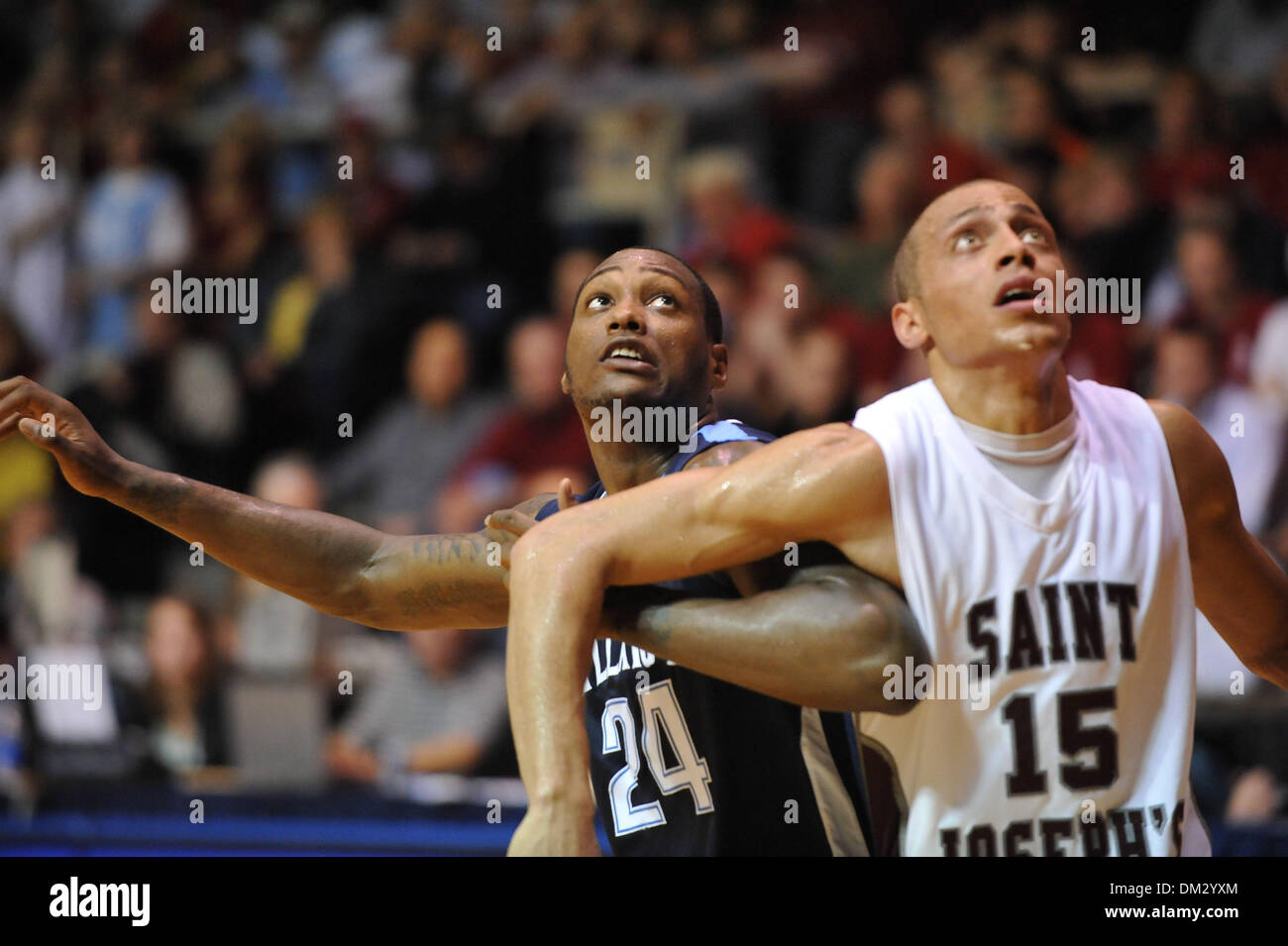 Villanova Guard Corey Stokes #24 and St. Josephs Guard Garrett ...