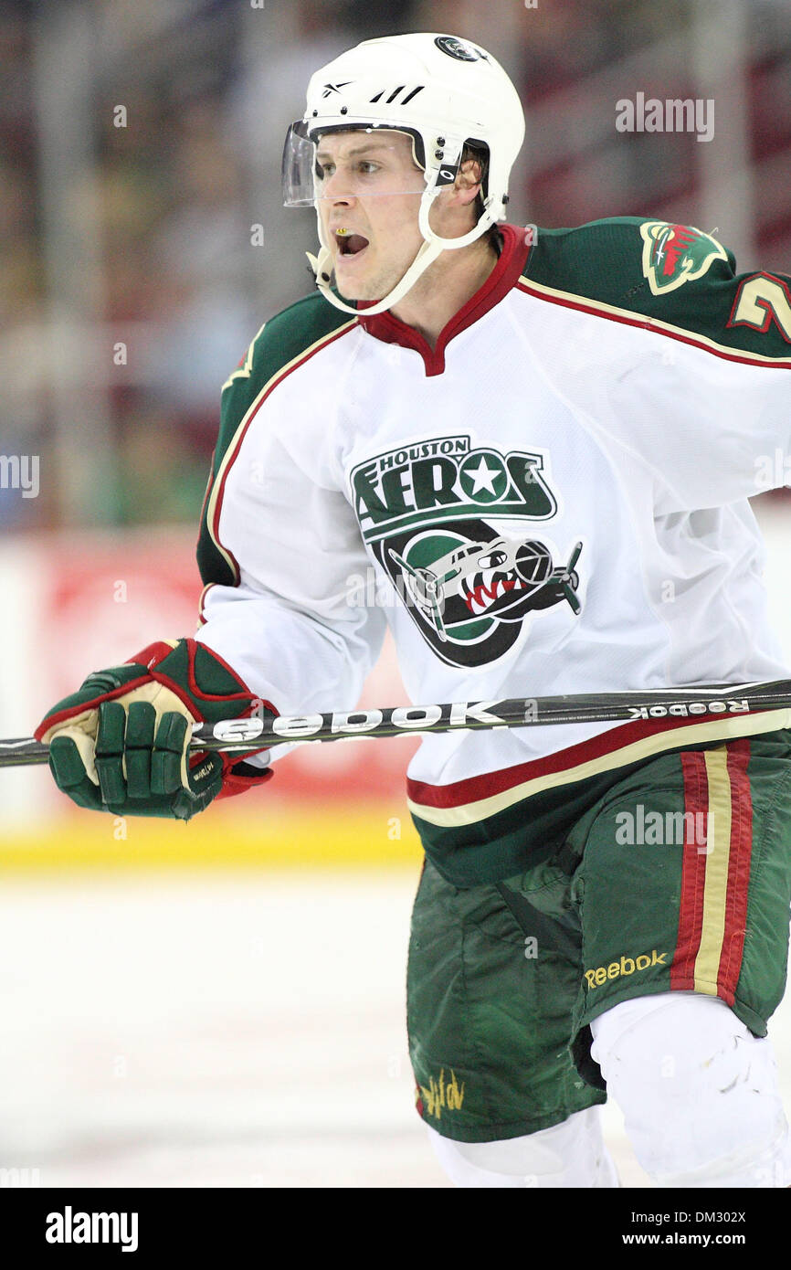 Houston Aeros Center Chad Rau (20) working the area in front of the net ...