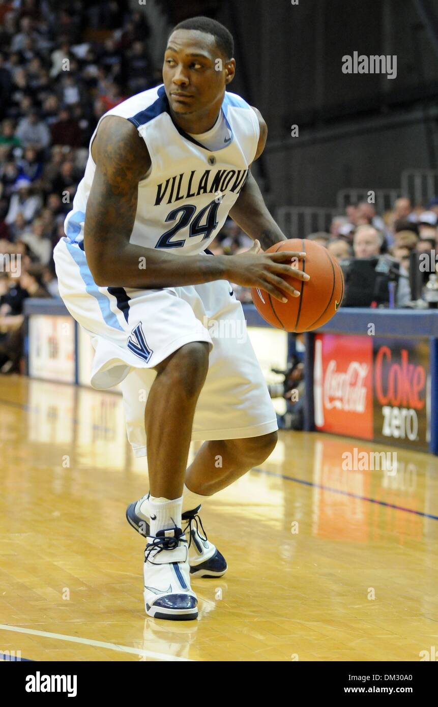 Villanova guard Corey Stokes #24 looks to pass the ball down low in a ...