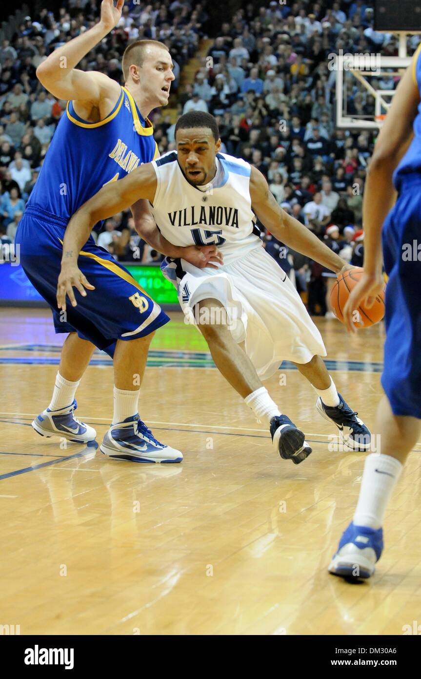 Villanova guard Maalik Wayns #5 drives past Delaware center Adam Pegg ...