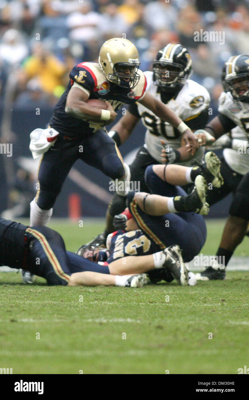 Navy Midshipmen Quarterback Ricky Dobbs (4) on a quarterback keeper ...