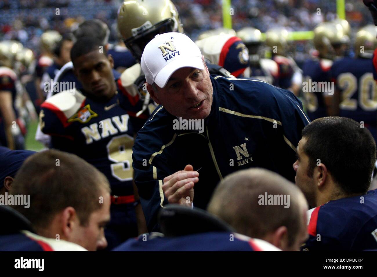 Navy coach has some words with the players. Navy defeated Missouri 31 ...