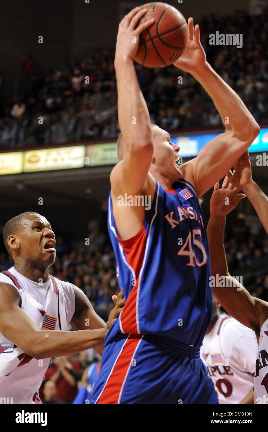 Kansas center Cole Aldrich #45 goes to the hoop strong during the first ...