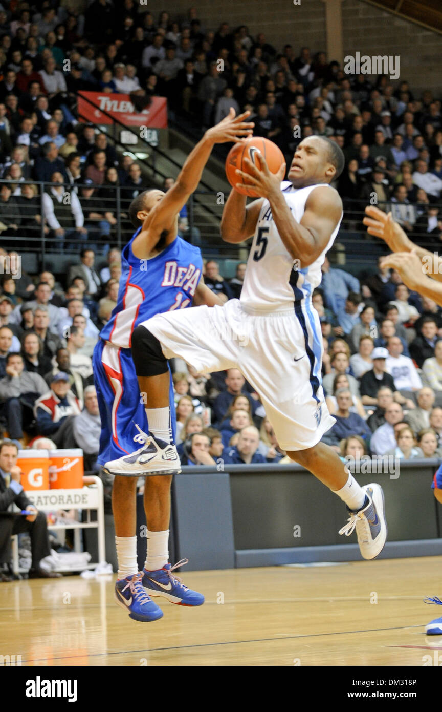 Villanova guard Maalik Wayns #5 drives past DePaul guard Jeremiah Kelly ...