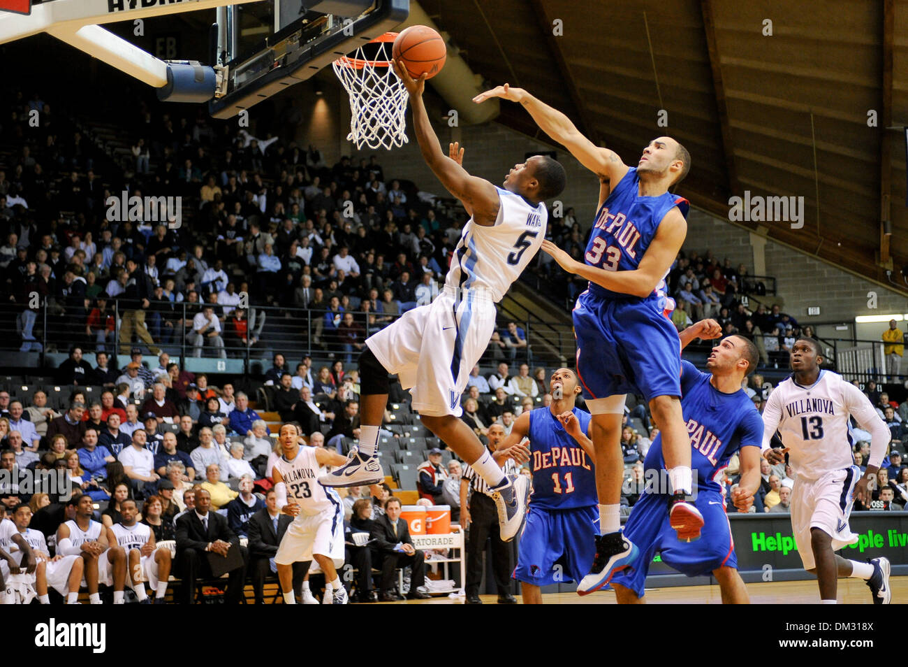 Villanova guard Maalik Wayns #5 drives past DePaul center Krys Faber ...