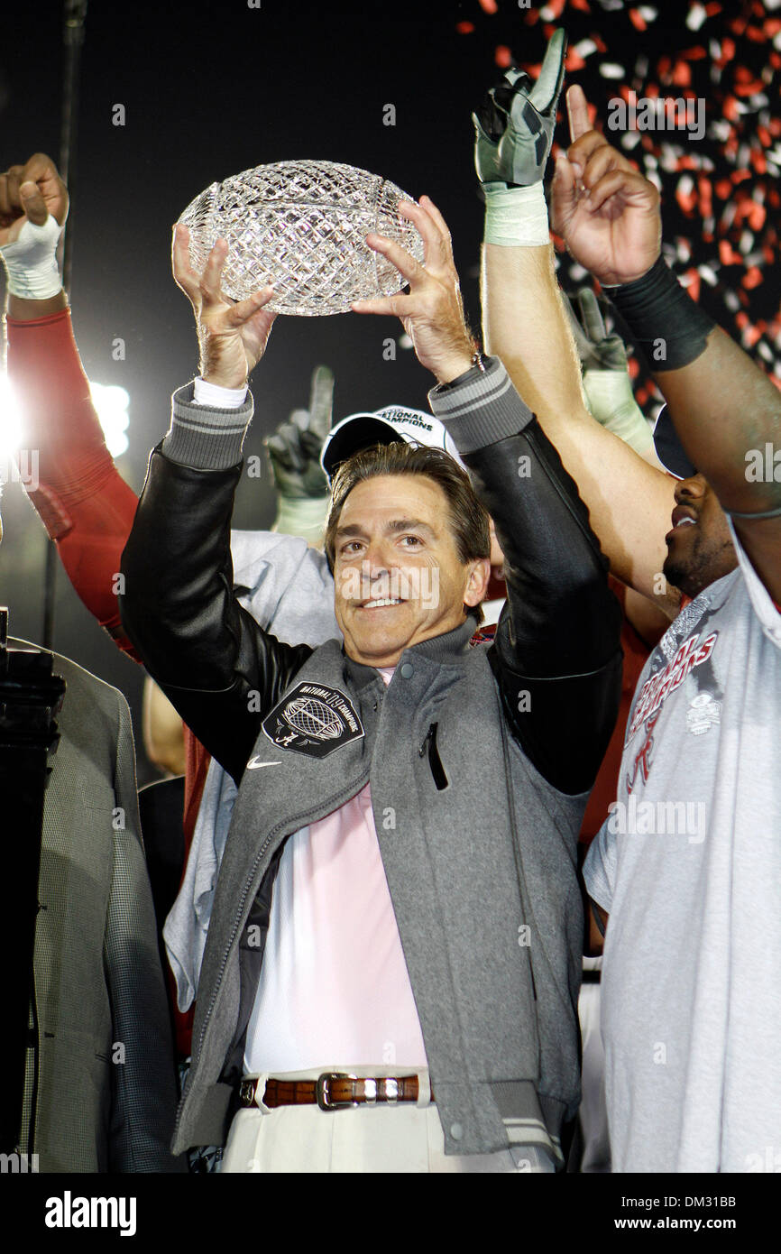 Alabama head Coach Nick Saban hoists the National Championship Trophy ...