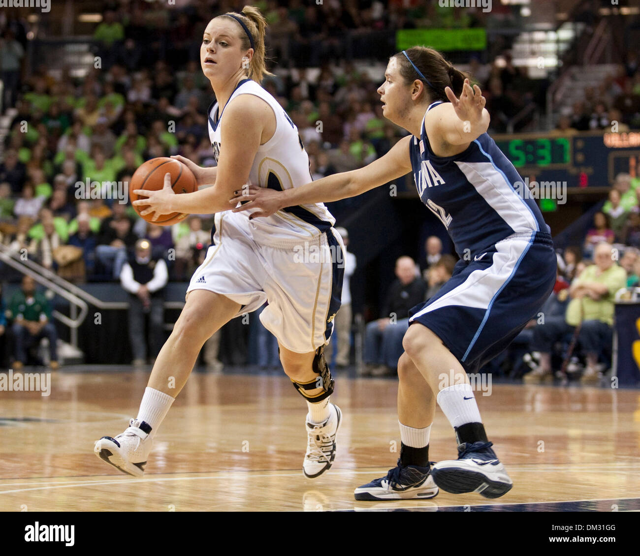 Villanova Guard Kyle Dougherty (12) and Notre Dame Guard Brittany ...
