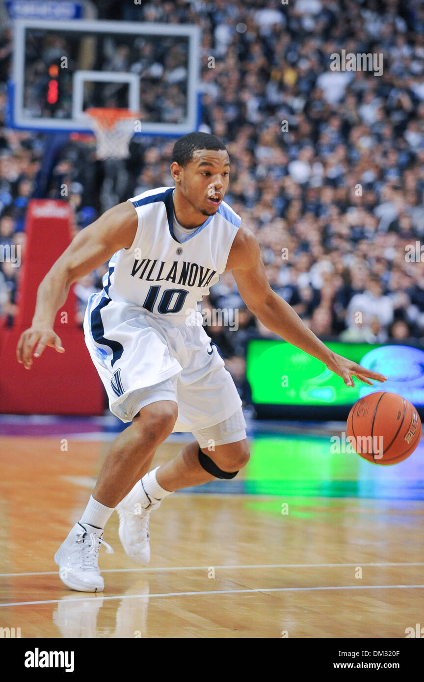 Villanova guard Corey Fisher #10 runs the offense, At the half ...