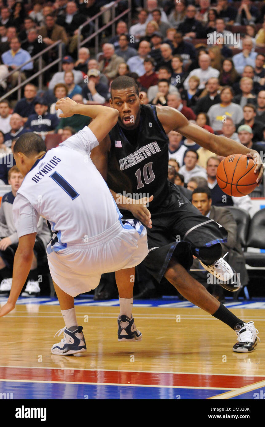 Georgetown center Greg Monroe #10 drives the baseline past Villanova ...