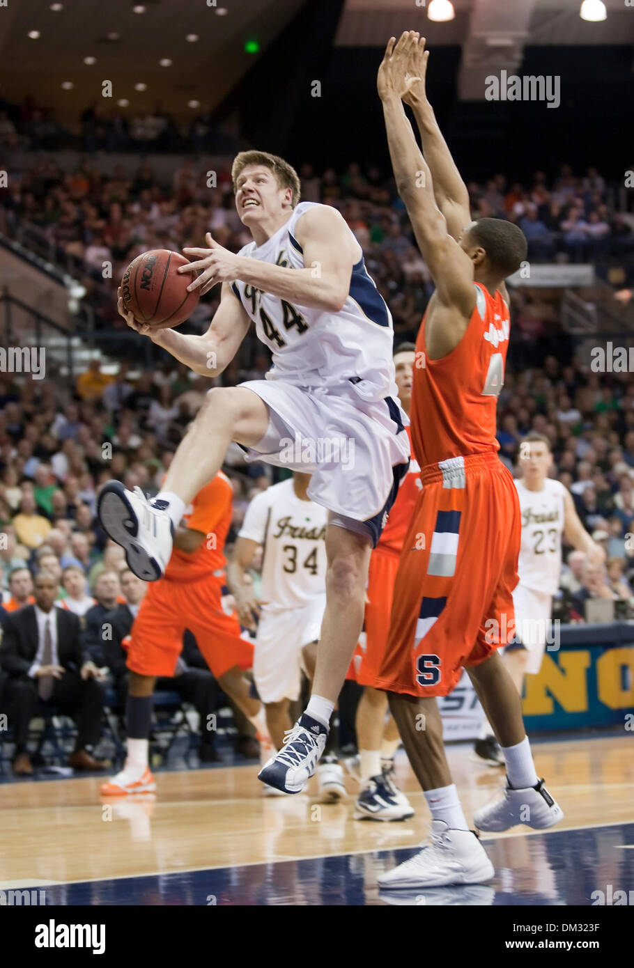 Notre Dame Forward Luke Harangody (44) goes in for layup over Syracuse ...