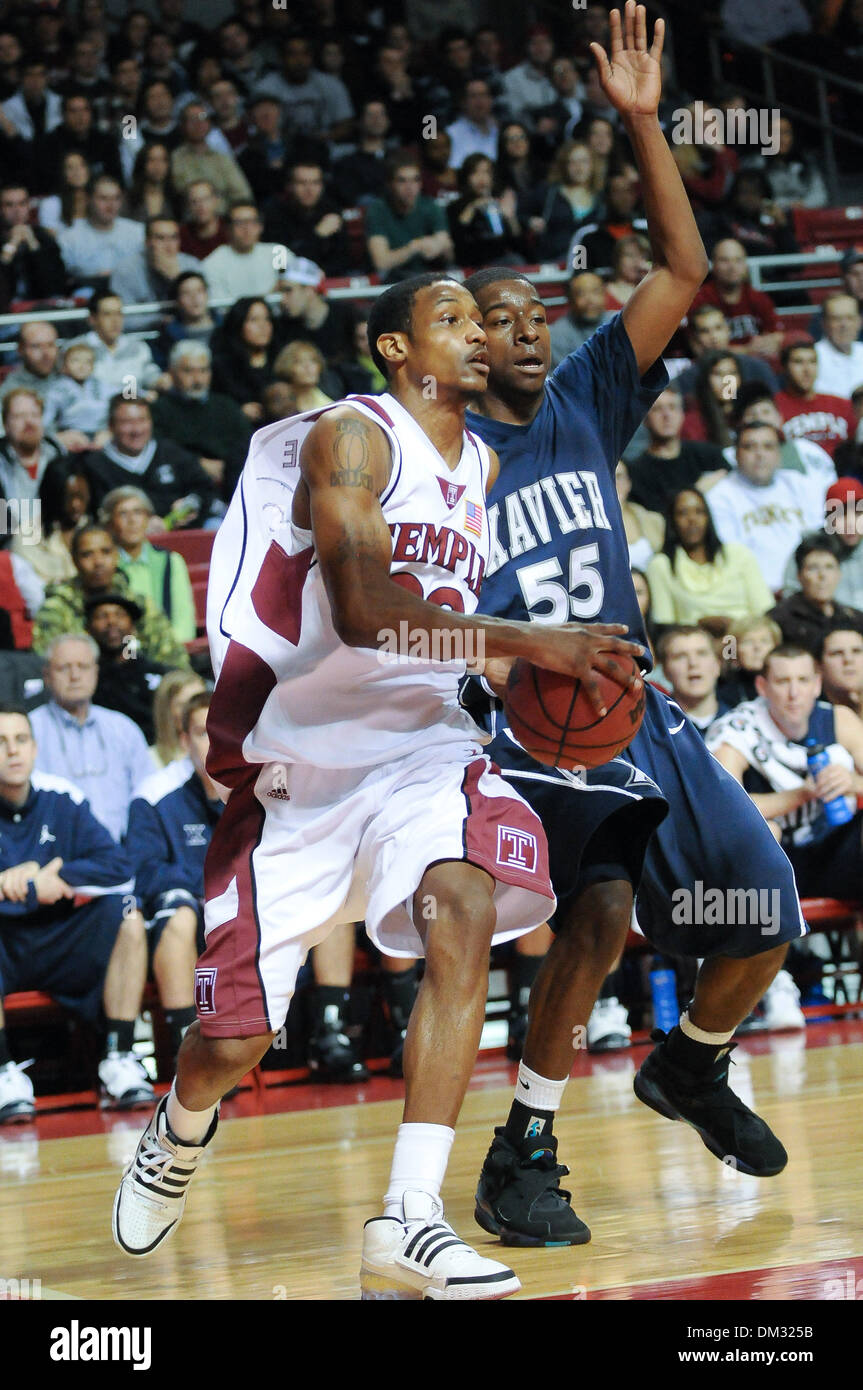 Temple guard Ramone Moore #23 drives to the basket in a game being ...
