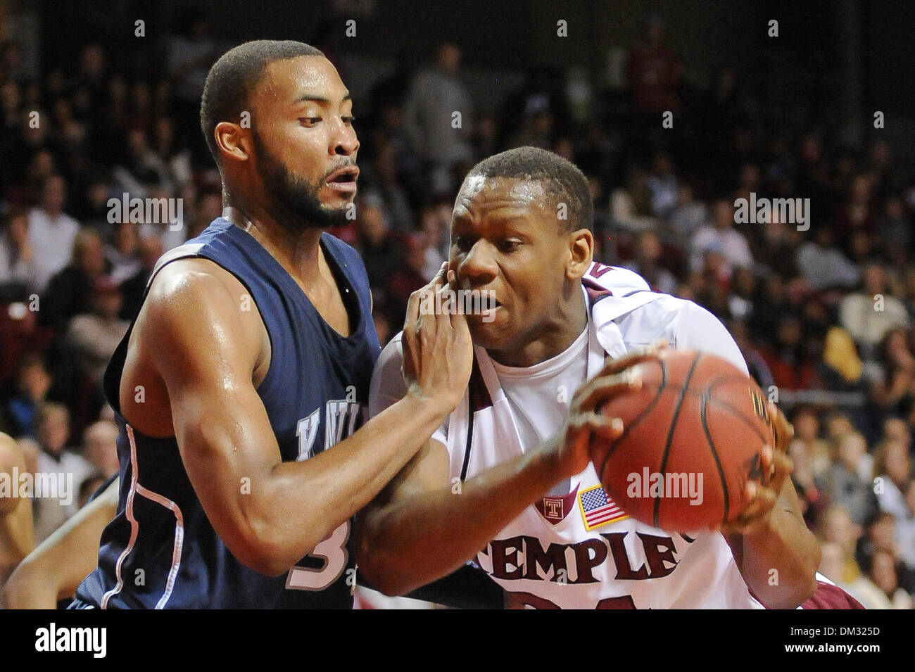Temple forward Lavoy Allen #24 leans into Xavier forward/center Jason ...