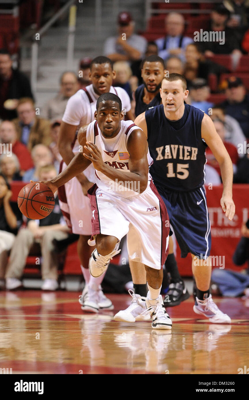 Temple guard Ryan Brooks #2 brings the ball up on a fast break while ...