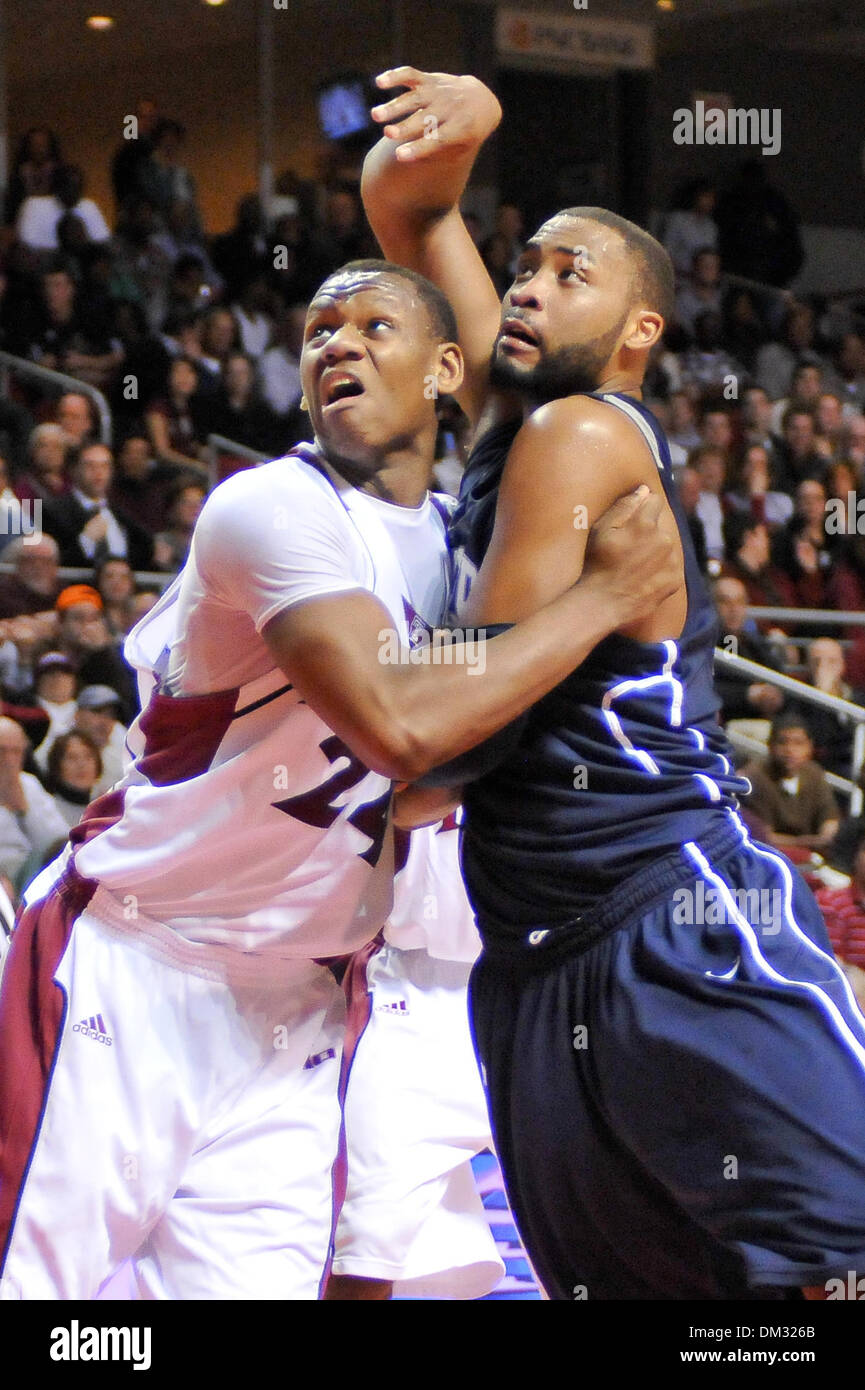 Temple forward Lavoy Allen #24 and Xavier forward/center Jason Love #31 ...