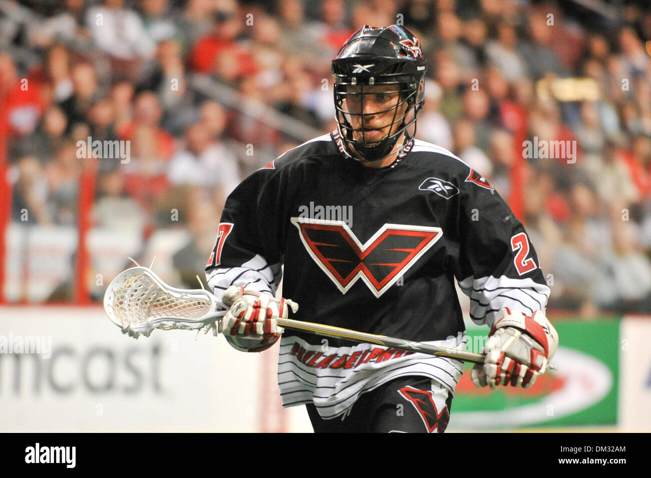 Philadelphia Wings Forward Mat Giles #27 runs up field during game play ...