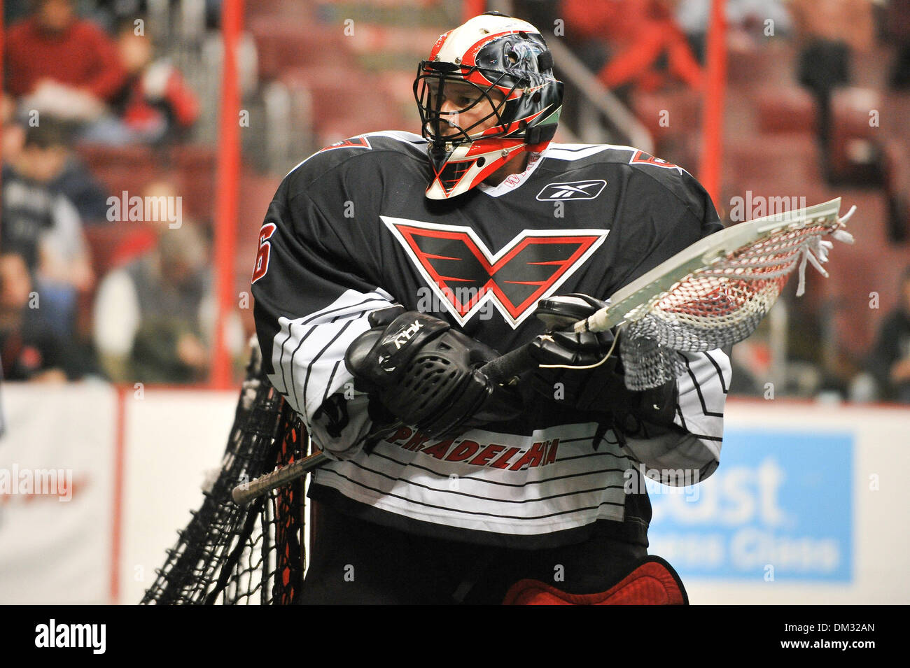 Philadelphia Wings Goalie Brandon Miller #36 wathes action behind the ...