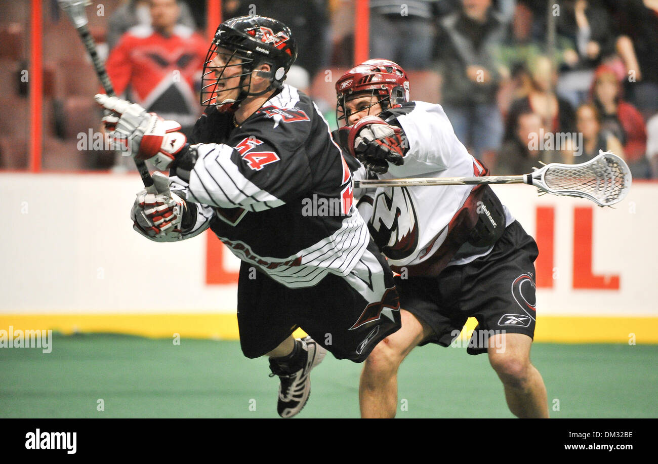 Philadelphia Wings Forward Jason Crosbie #54 goes flying after being ...