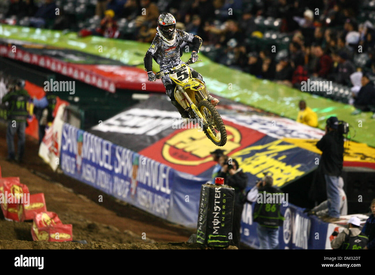 Ryan Dungey flies above the crowd wile leading the early race in the ...