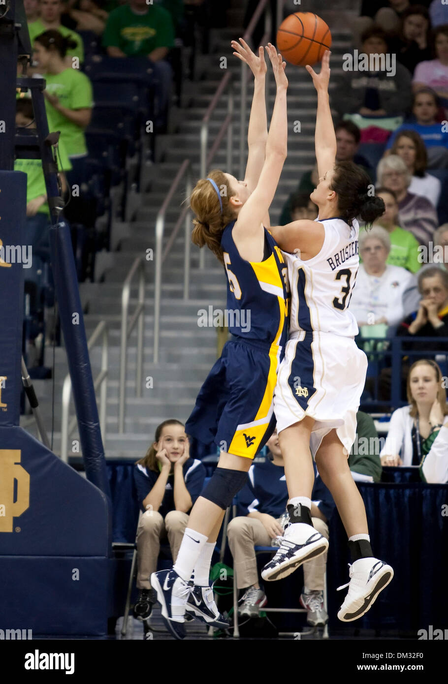 Notre Dame Forward Becca Bruszewski (32) drives against West Virginia ...