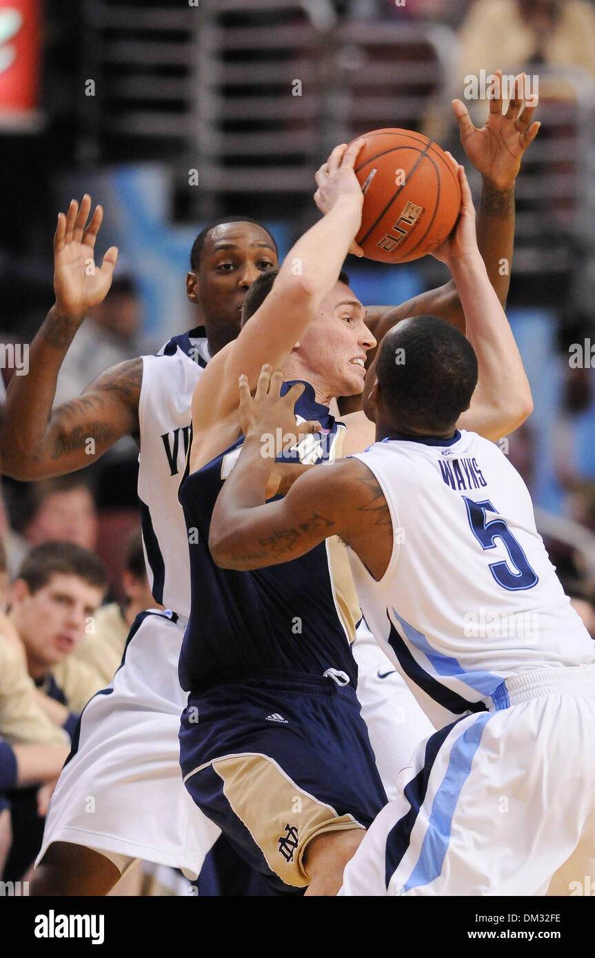 Notre Dame guard Ben Hansbrough #23 is surrounded by Villanova guard ...