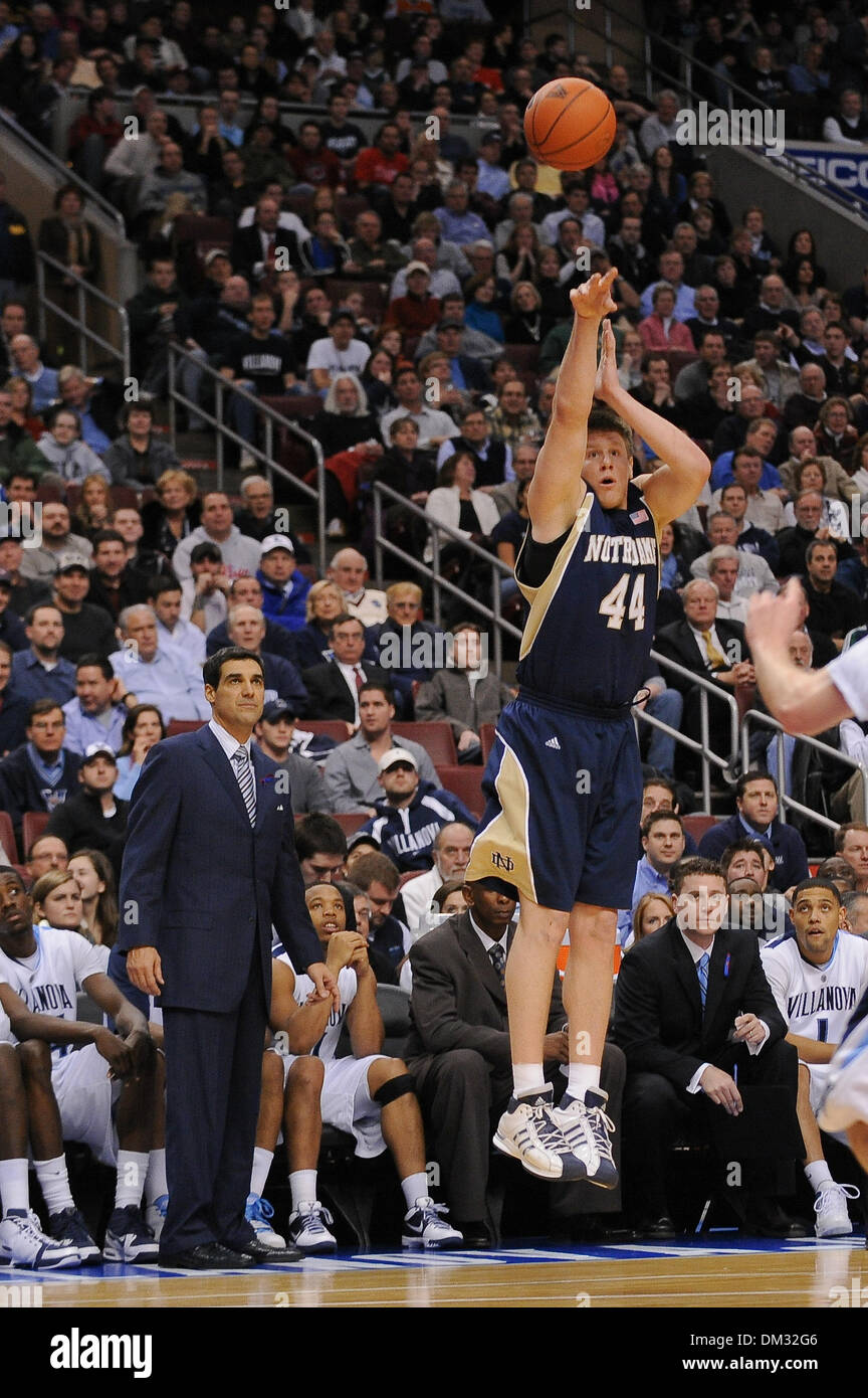 Notre Dame forward Luke Harangody #44 shoots as Jay Wright looks on. At ...