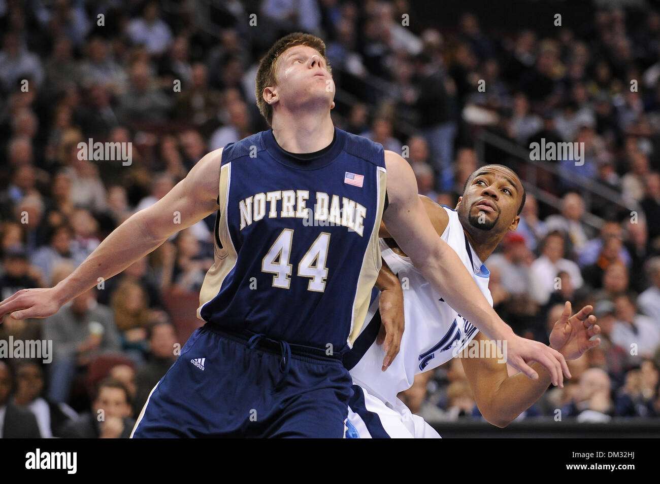 Notre Dame forward Luke Harangody #44 blocks out Villanova guard Reggie ...