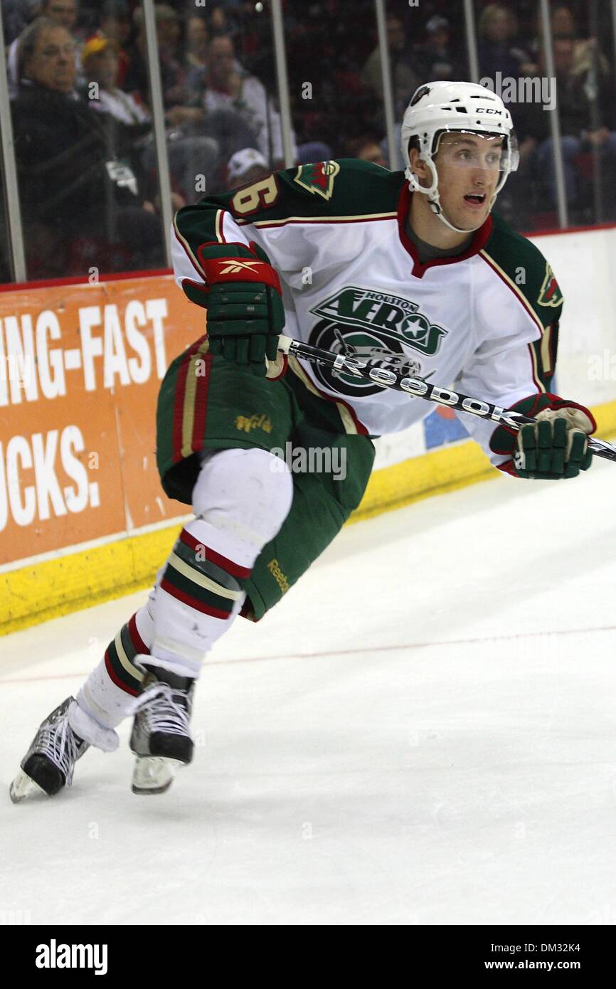 Houston Aeros Brandon Buck (16) starts the drive from back behind the ...