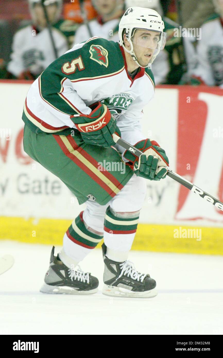 Houston Aeros Defenseman Ryan Gunderson (5) controls the puck at center ...