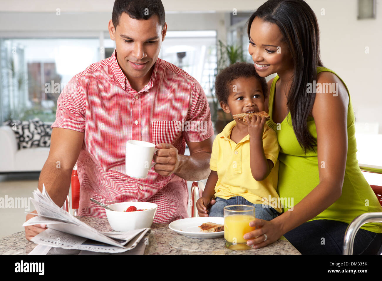 Child breakfast newspaper hi-res stock photography and images - Alamy