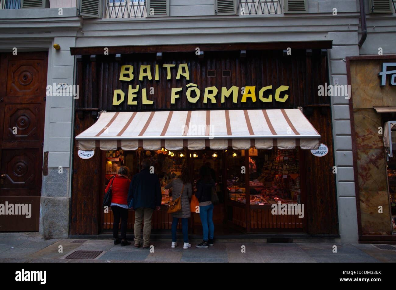 Gourmet cheese food shop exterior Via Lagrange street central Turin ...