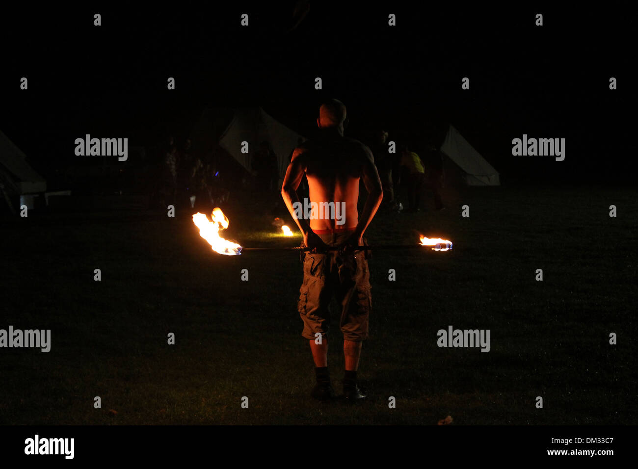 Man fire spinning poi hi-res stock photography and images - Alamy