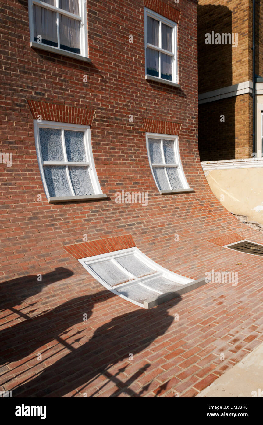 'From the knees of my nose to the belly of my toes', the house sliding ...