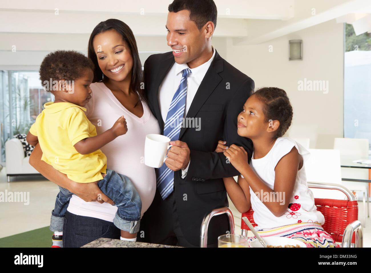 Father Leaving Family Breakfast For Work Stock Photo - Alamy
