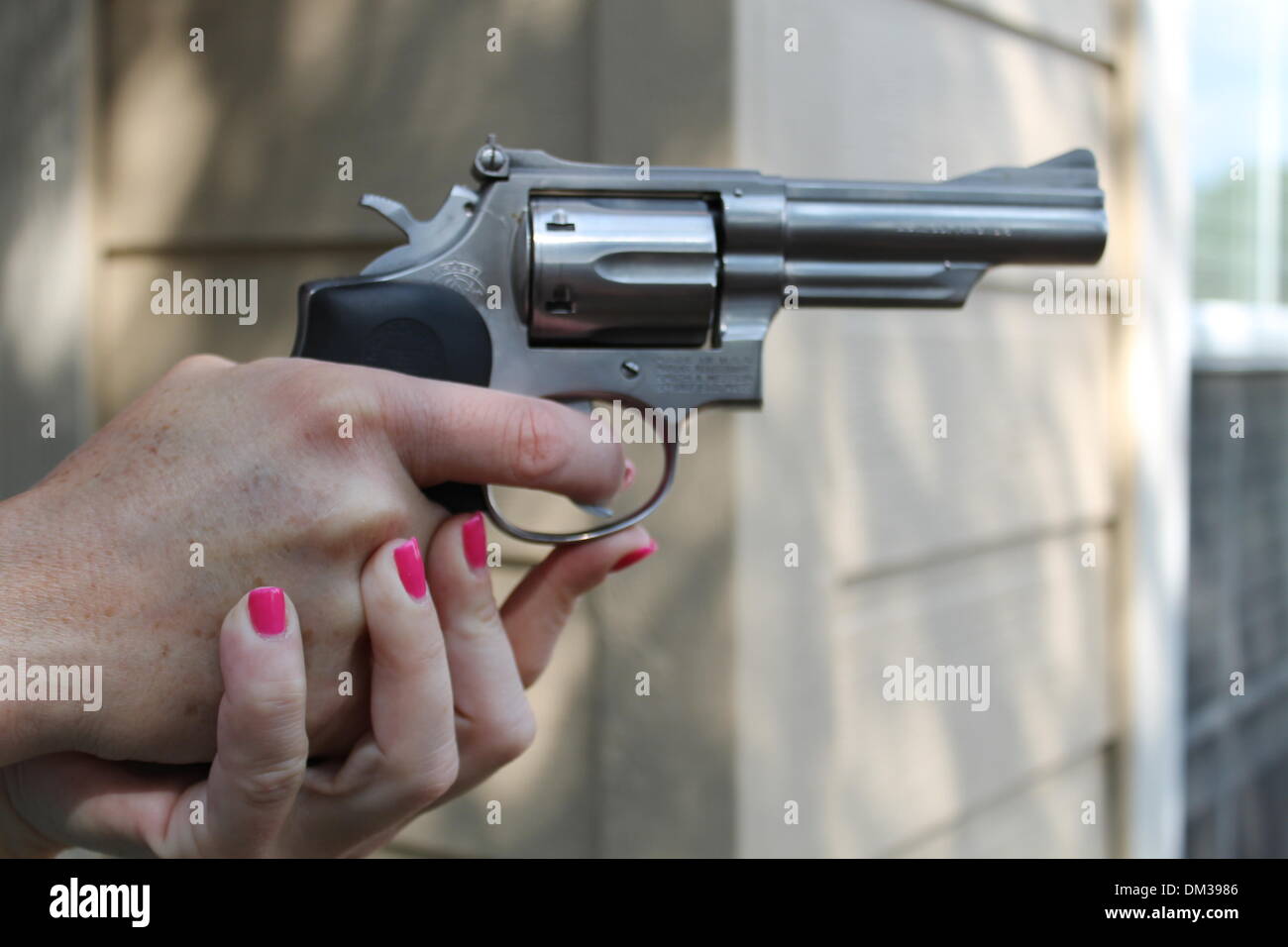 A Woman With Red Nails Is Holding A Revolver By Smith And Wesson Picture Taken On 12 July 2012 In
