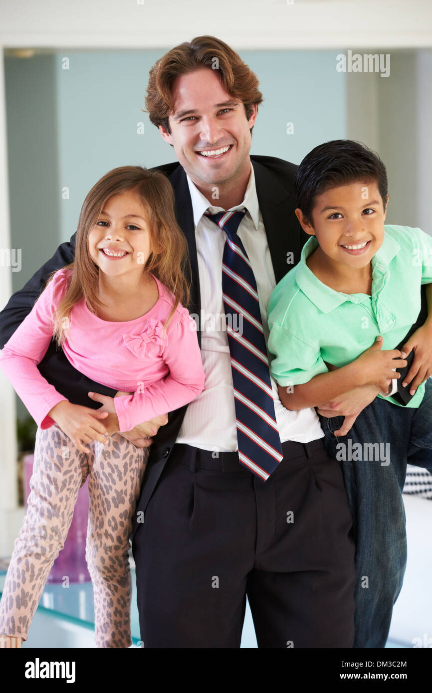 Children Greeting Father On Return From Work Stock Photo - Alamy