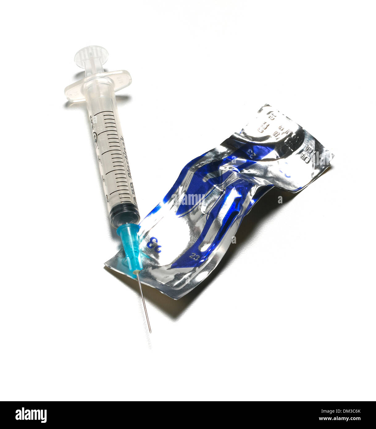 Syringe cut out on white background Stock Photo - Alamy