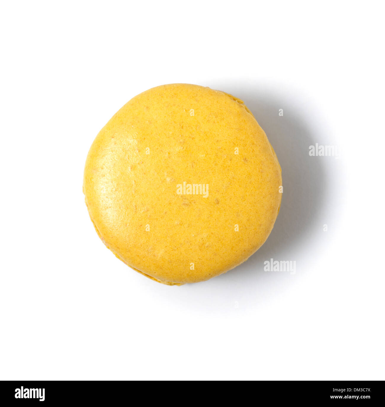 yellow macaroon cut out on white background Stock Photo - Alamy