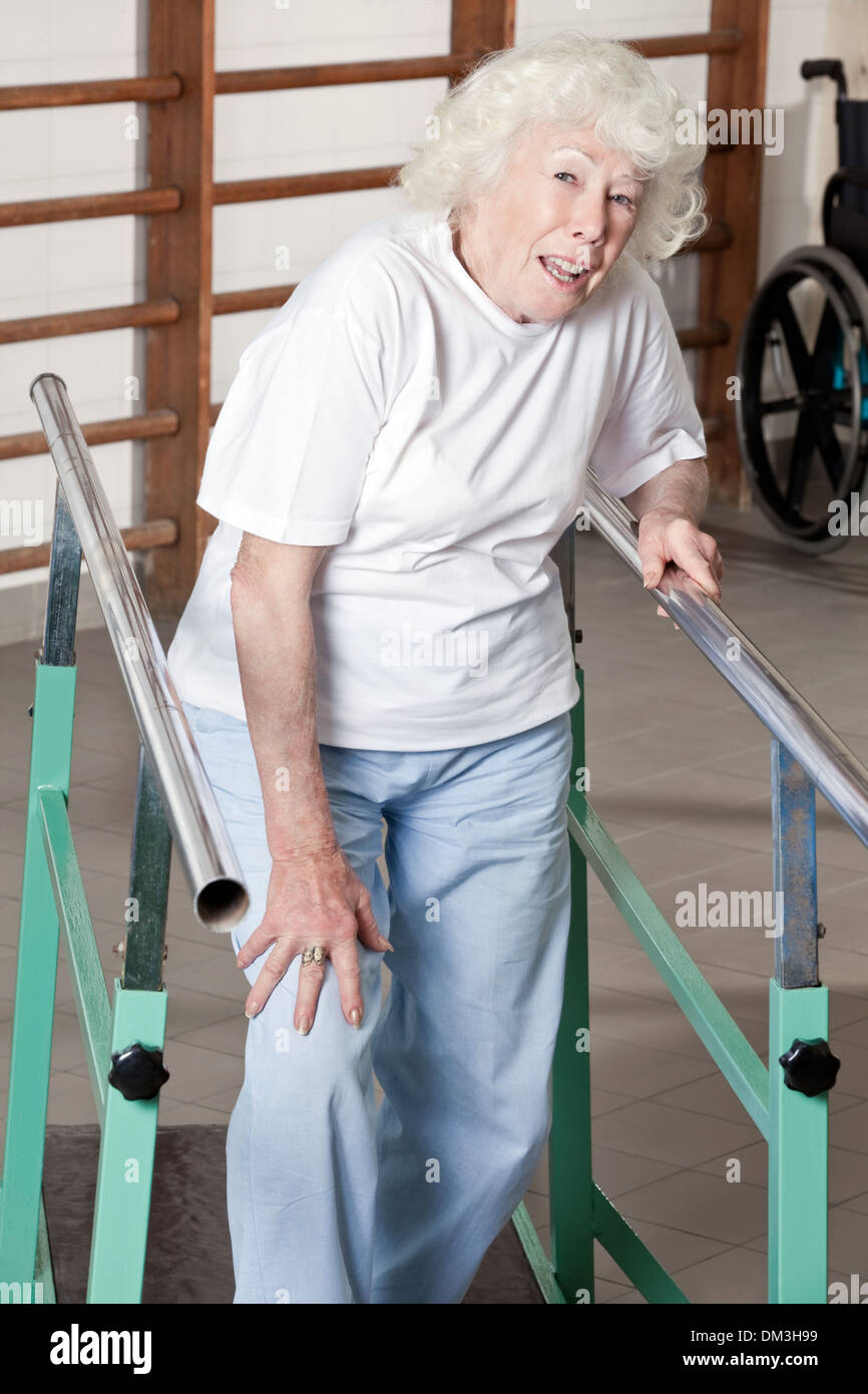 Senior Woman having ambulatory therapy Stock Photo - Alamy