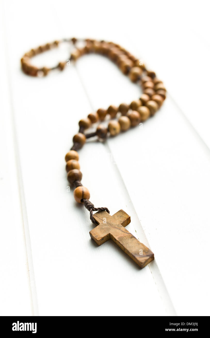 Rosary crucifix bible table Cut Out Stock Images & Pictures - Alamy